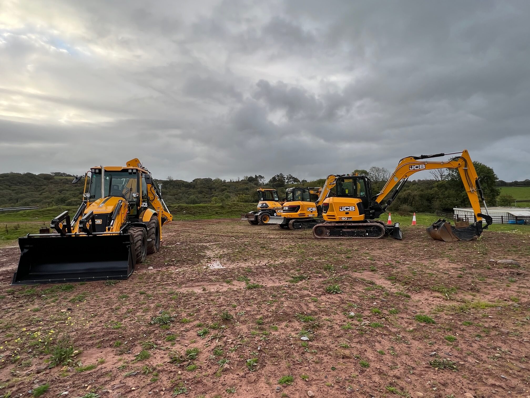 JCB 'dig day' at ACOP group - ACOP