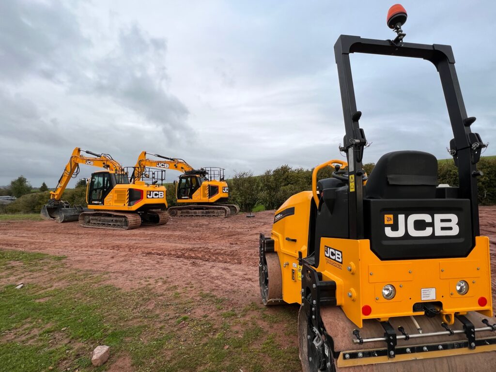 JCB 'dig day' at ACOP group - ACOP